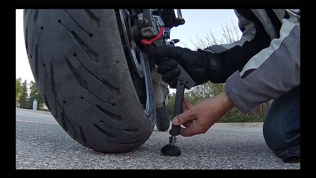 Light weight, portable jack for chain maintenance. - YouTube