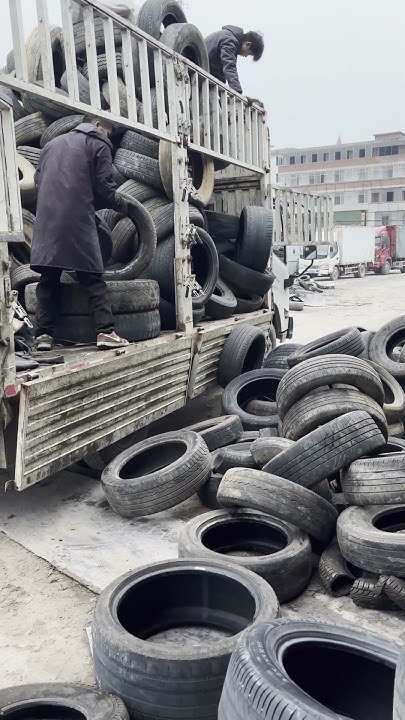 Old tires, the process of manual unloading - YouTube