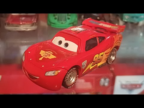 Mattel Disney/Pixar Cars 2 Lightning McQueen with Travel Wheels (World Grand Prix) Piston Cup Racer