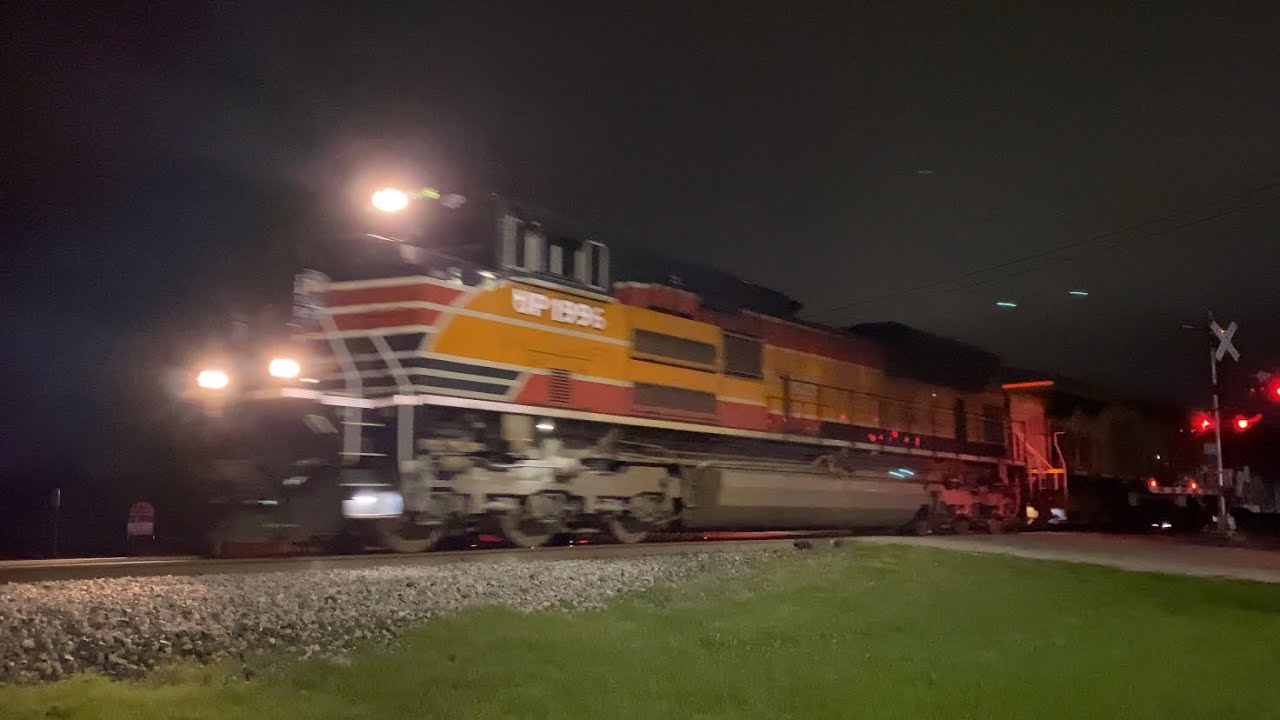 Union Pacific’s Southern pacific heritage unit 1996 leads a train through Hutto,Tx on a cold ...
