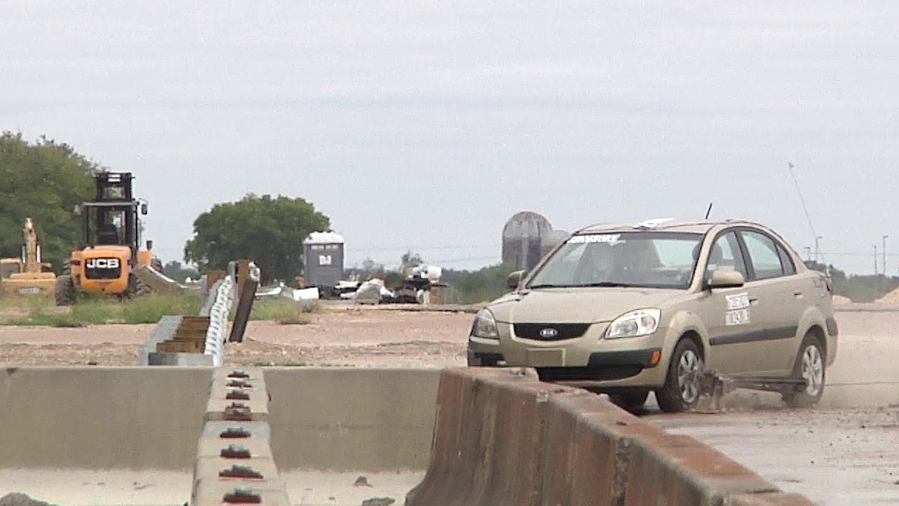 Guardrail Transition from 32-inch Tall MGS Weak Post System to MGS ...