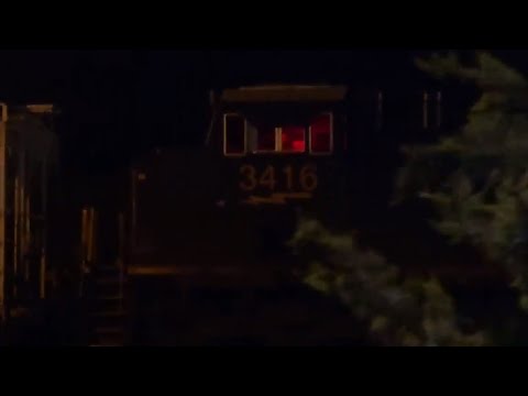 Red light on inside of engine. csx grain train Northbound out of ...
