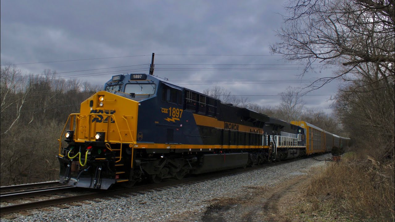 CSX M216-29 slowly crawling with CSX 1897 (Monon) leading & CSX 1853 ...