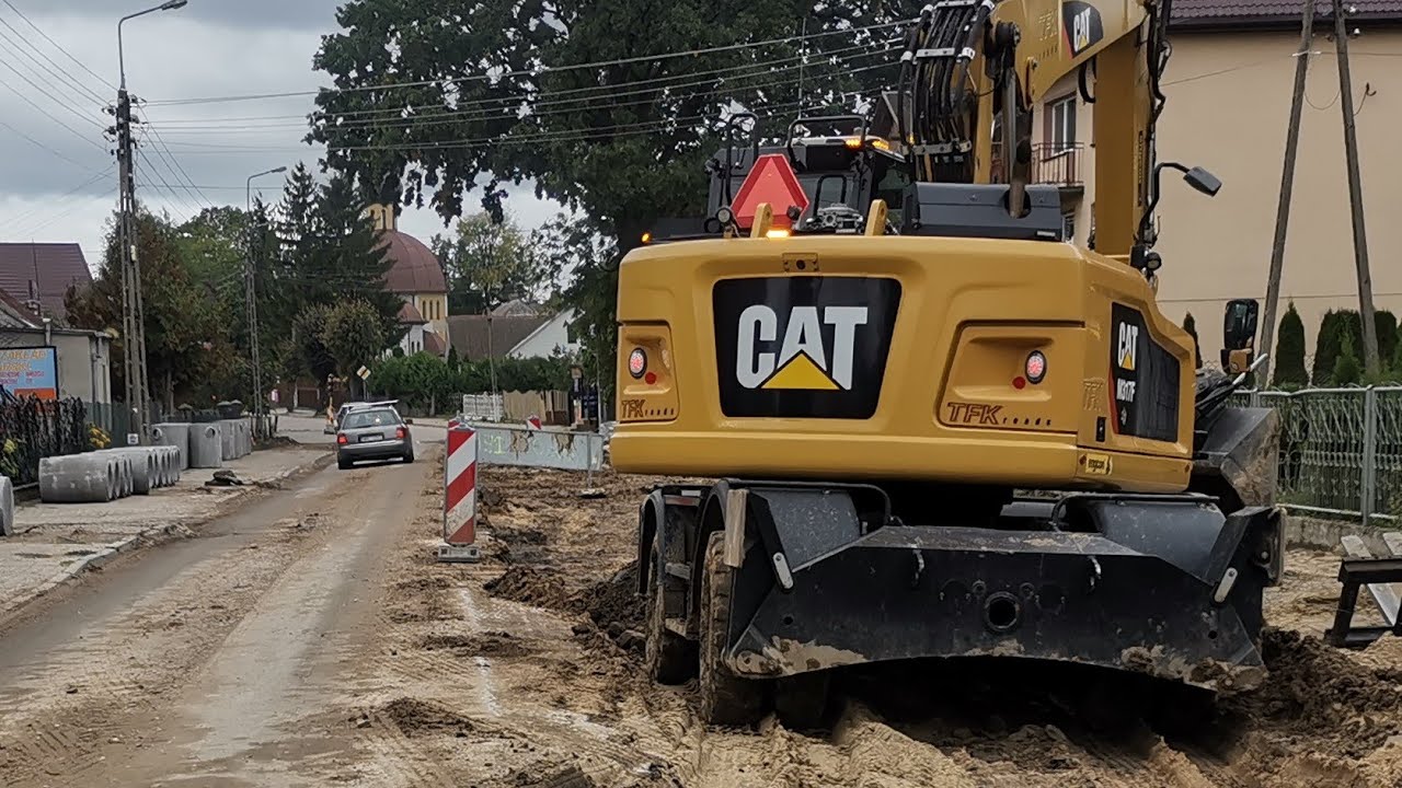 Cat M317F tiltrotator Engcon korytowanie i zasypywanie koryta - YouTube