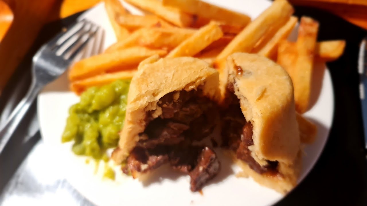 English steak pudding, chips, and peas. - YouTube