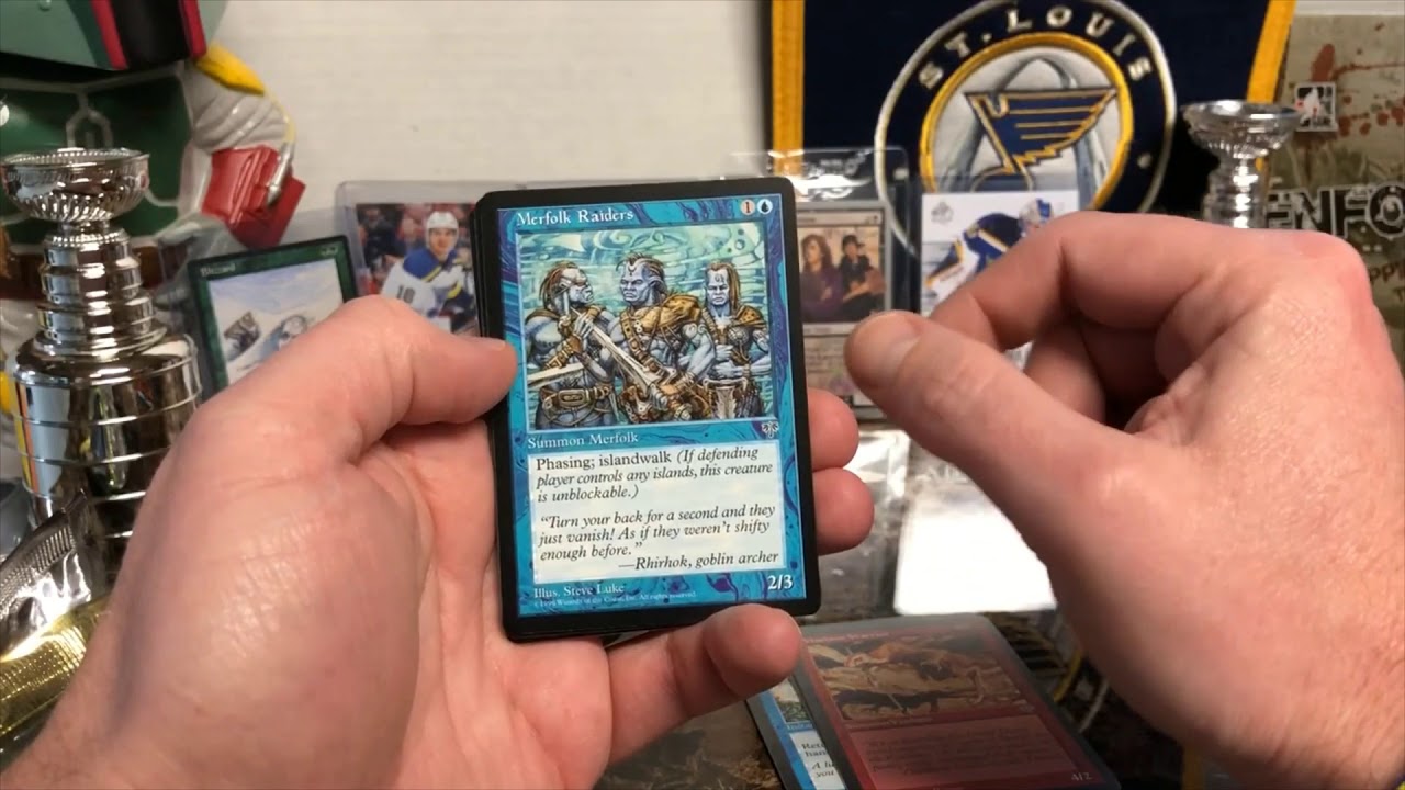 Opening a booster pack of Magic the Gathering from the Mirage Set ...