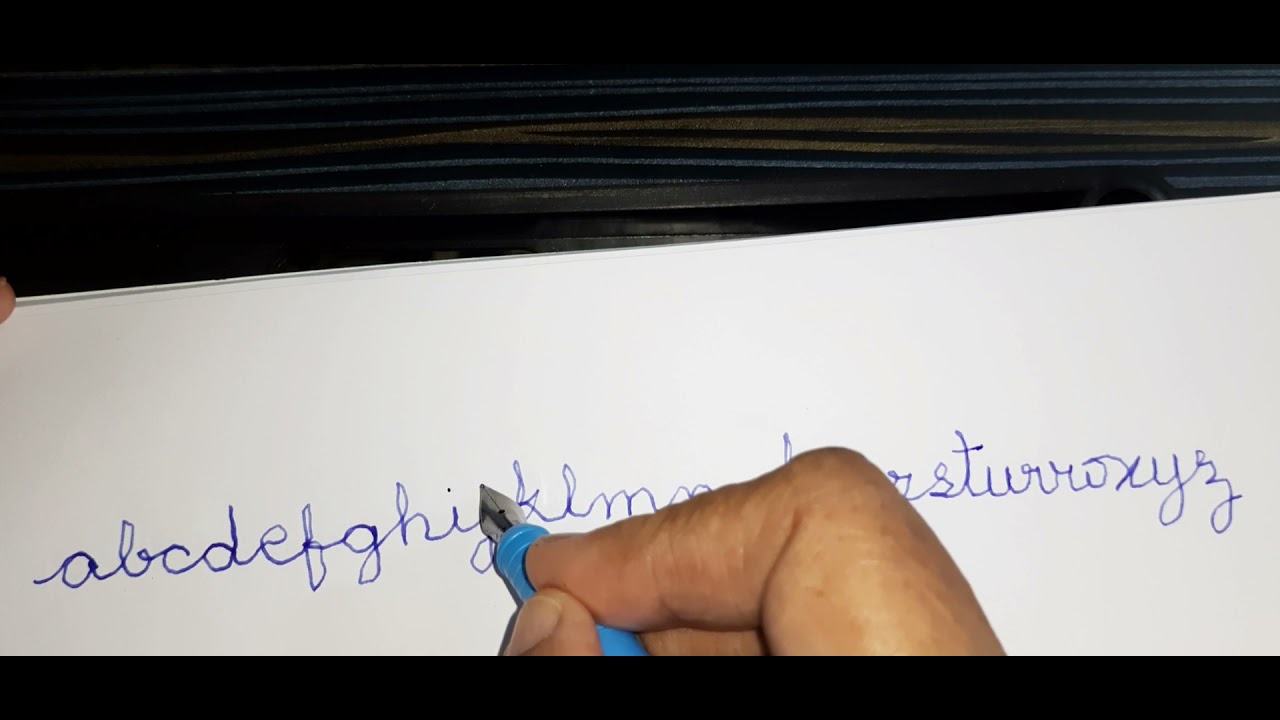cursive writing cursive writing by my dadi ji without using lines - YouTube