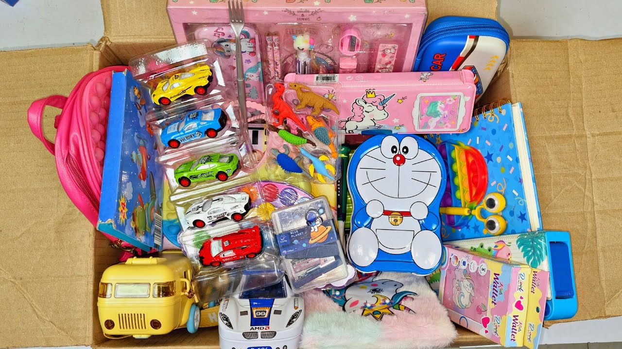 Box full of mix stationery - piggy bank, unicorn purse, popit bag ...