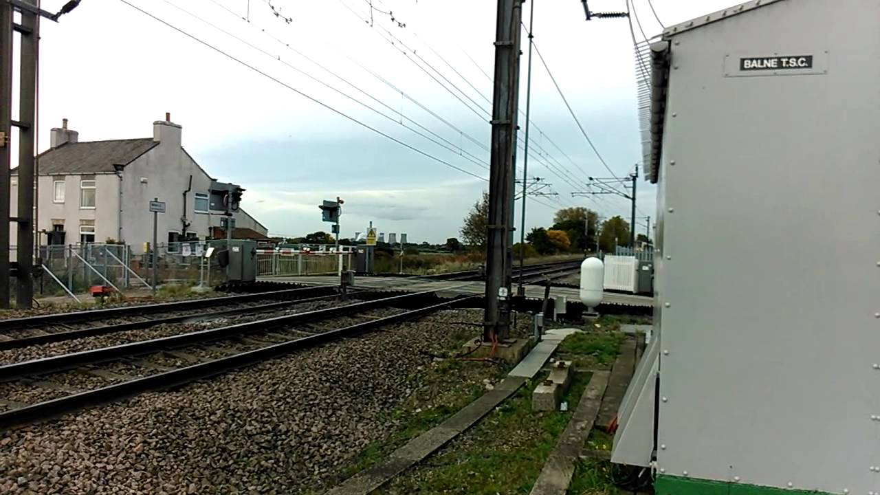 Fast Train at Balne Level Crossing in Yorkshire, England Sept 2015 ...