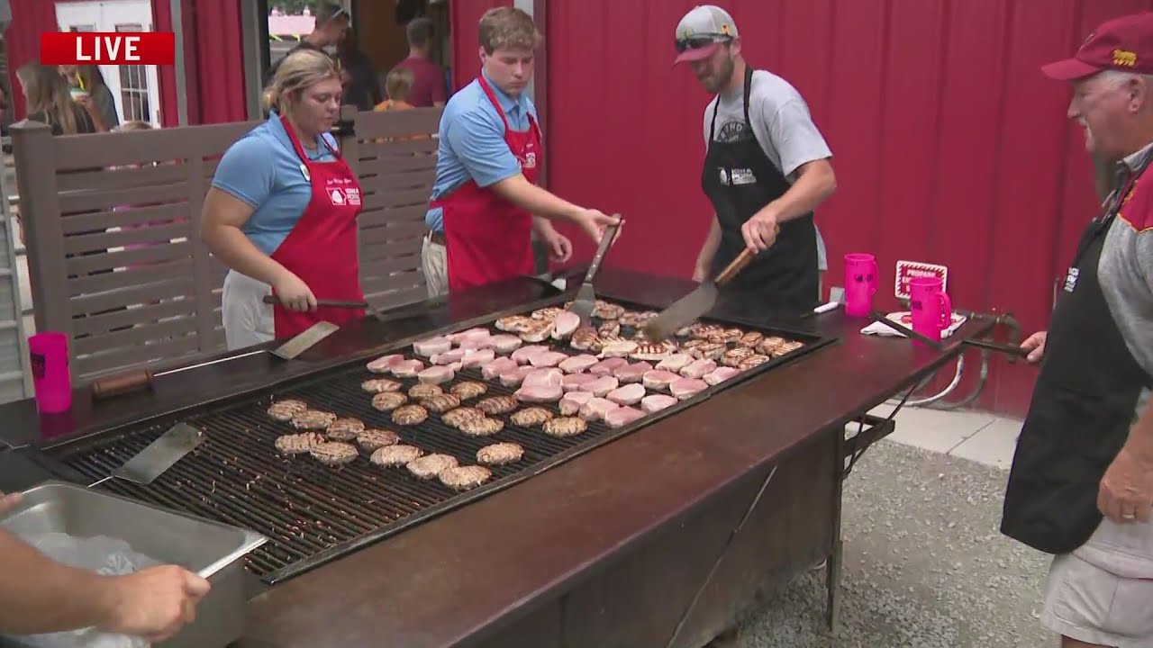 Ed Wilson live at Iowa State Fair monitoring the side grill at the Pork ...
