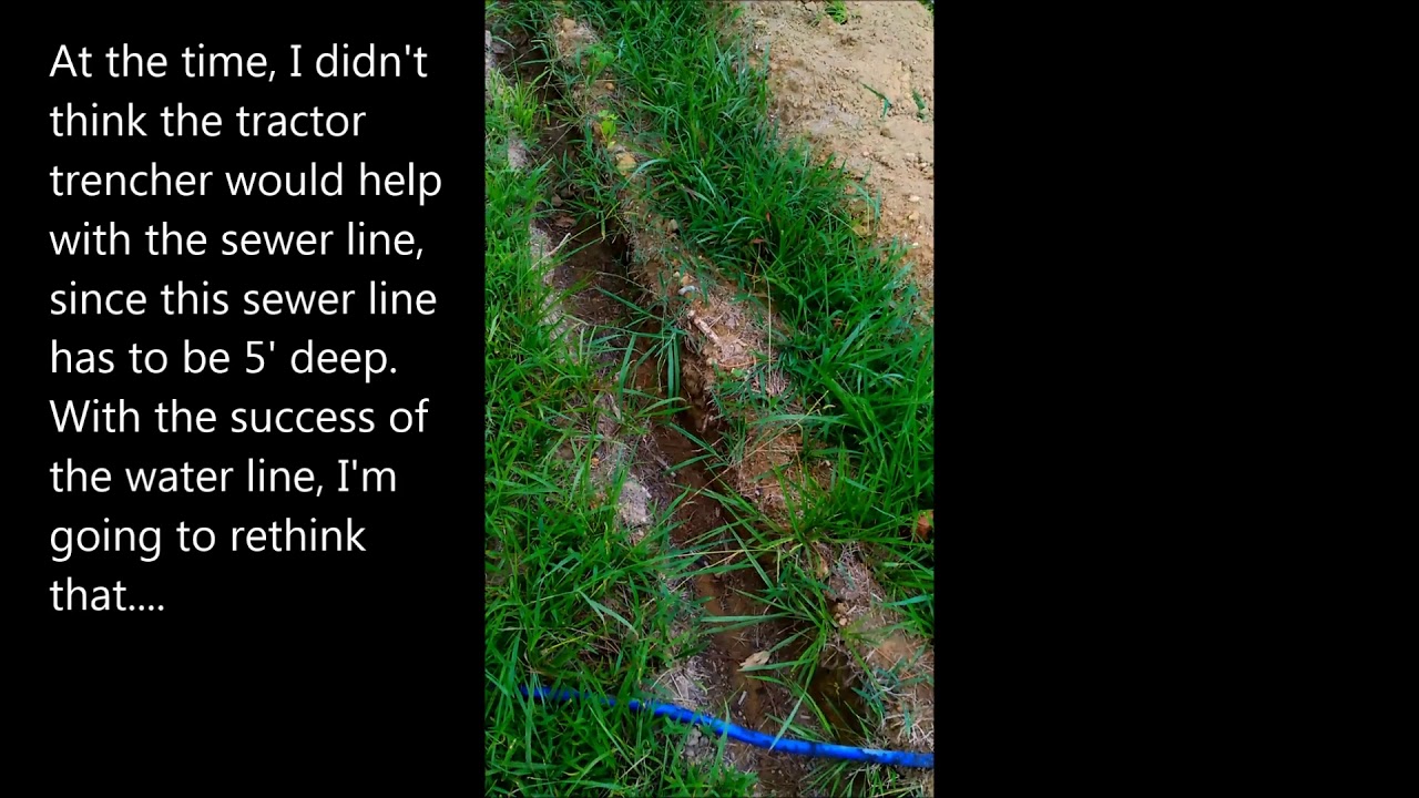 Trenching a water line - YouTube