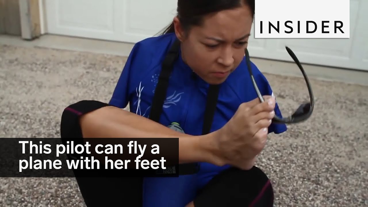 This badass pilot can fly a plane with her feet - YouTube