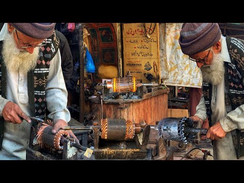 65 Old Expert Electrician Demonstrating The Rewinding Technique on a Truck Starter Motor Armature