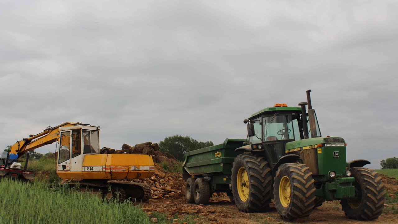 Moving Quarry rock with the John Deere 4455 and JCB 814 - YouTube