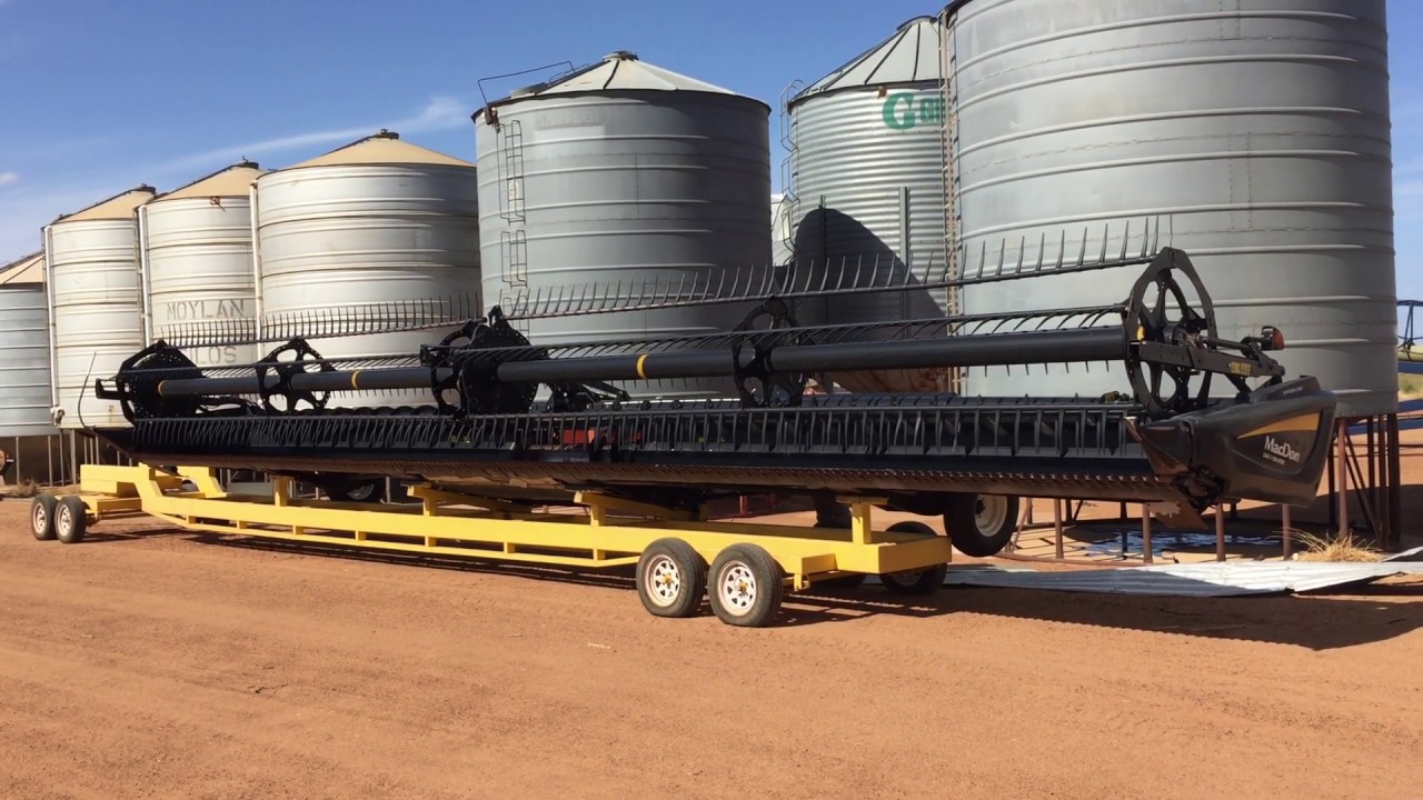 2016 Macdon D65D Draper Header on Quad Axle Comb Trailer (GA014) - YouTube