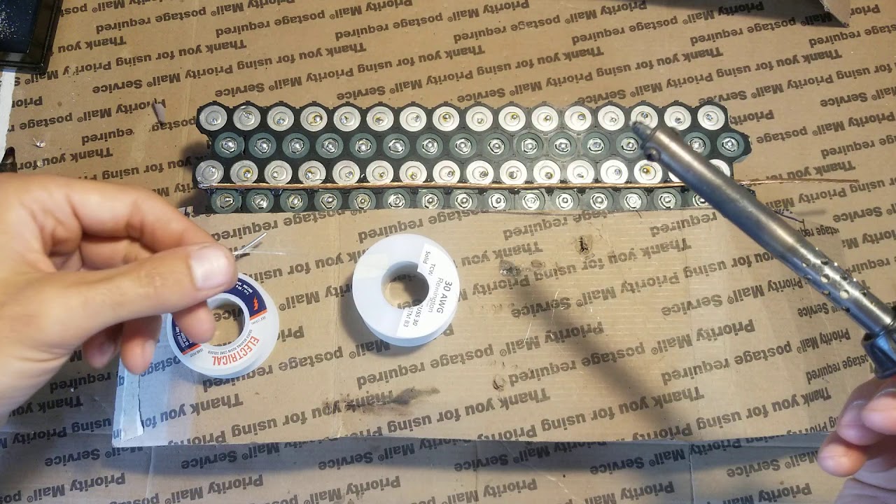 Soldering fuse wire to 18650s, 72v 48aH e-motorcycle battery pack - YouTube