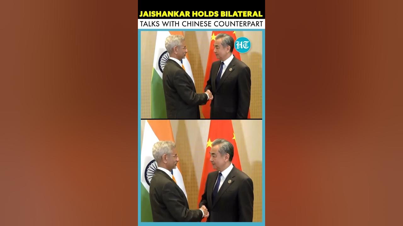 EAM S Jaishankar Meets Chinese Counterpart Wang Yi On The Sidelines Of G20 Summit - YouTube