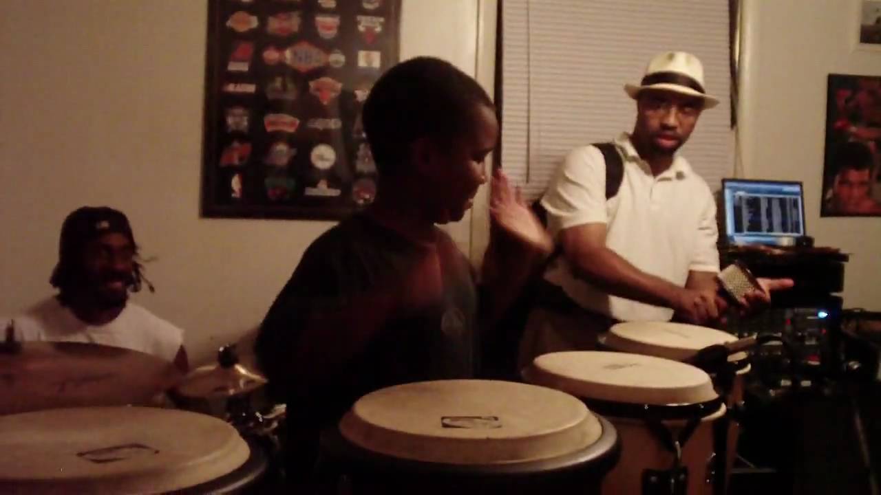 8 years old and playing the congas - YouTube