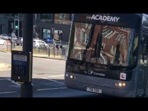 Transdev driver learner vehicle Volvo B10BLE T16 TDV driving past on ...
