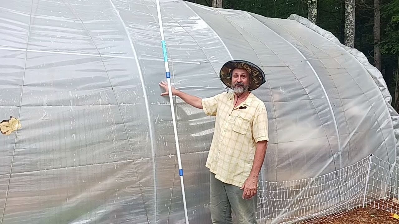Washing the Greenhouse Plastic on our Farmers Friend Caterpillar High ...