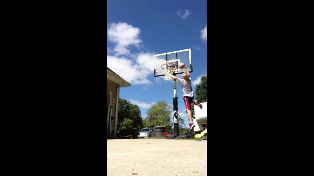 Little kid dunks on 7.5 hoop - YouTube