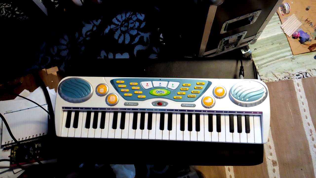 Toy keyboard unknown brand - demo songs - YouTube