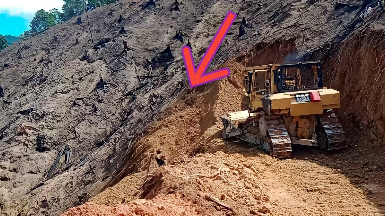 Very extreme paving the way on the edge of the abyss CAT BULLDOZER D6R ...