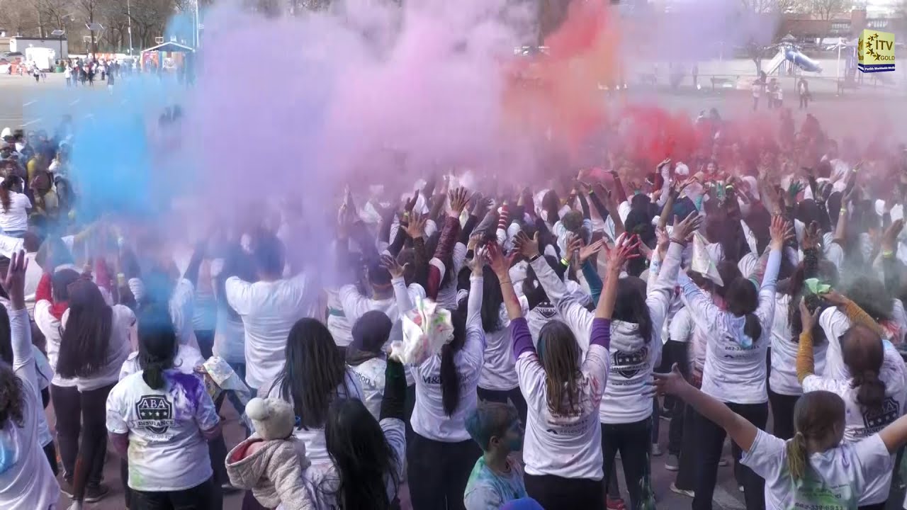 Fair Lawn residents celebrate the spring color blast with Holi - YouTube