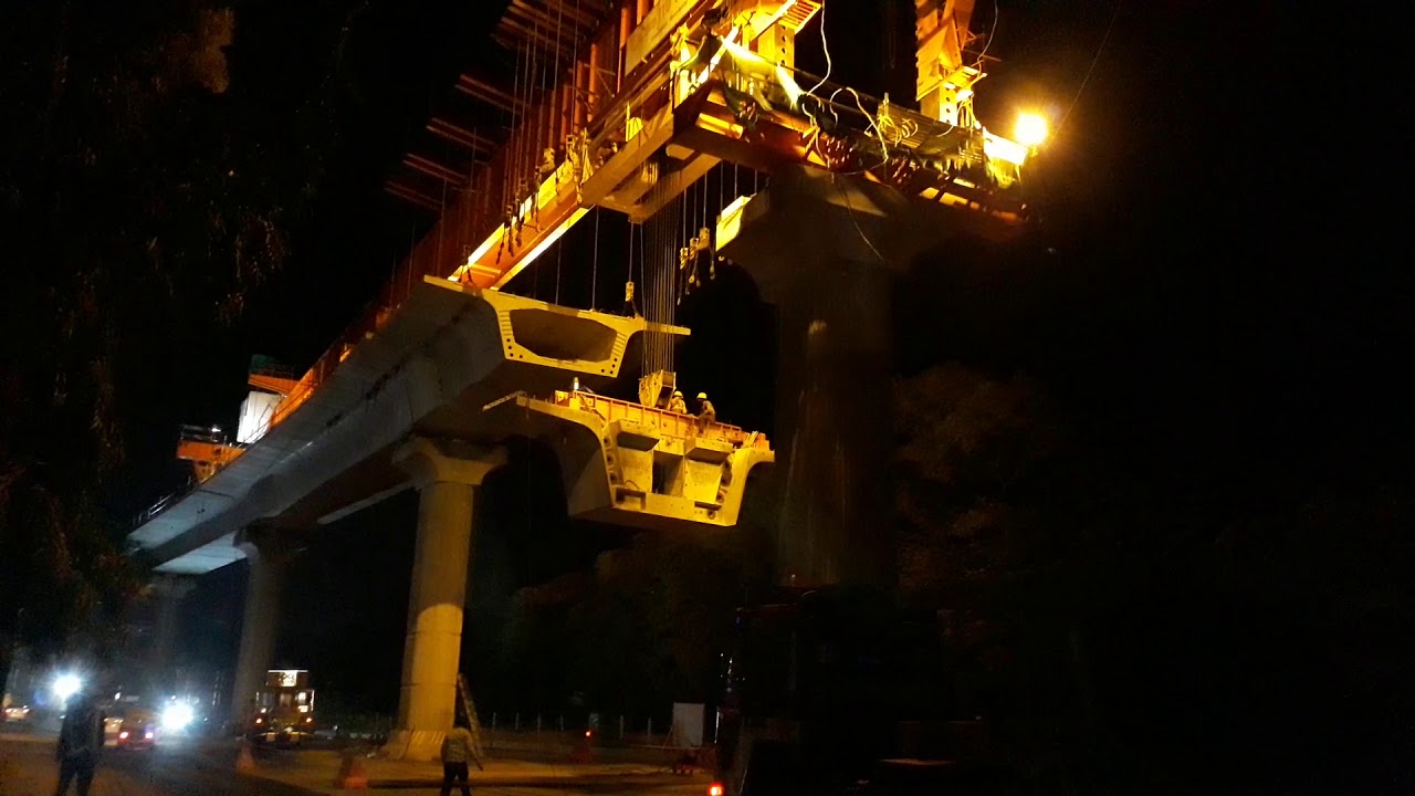 Launching girder segment lifting - YouTube
