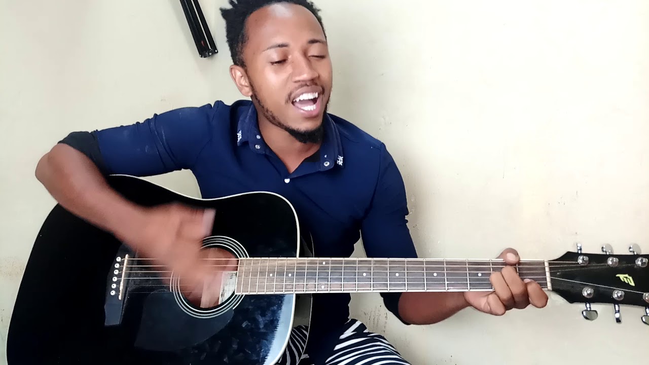 Allymond playing acoustic to 3 Otilebrown song #Dusuma#Quarintine# ...