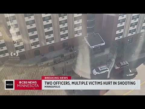 Eyewitness videos show police swarm outside Minneapolis apartment building amid shots