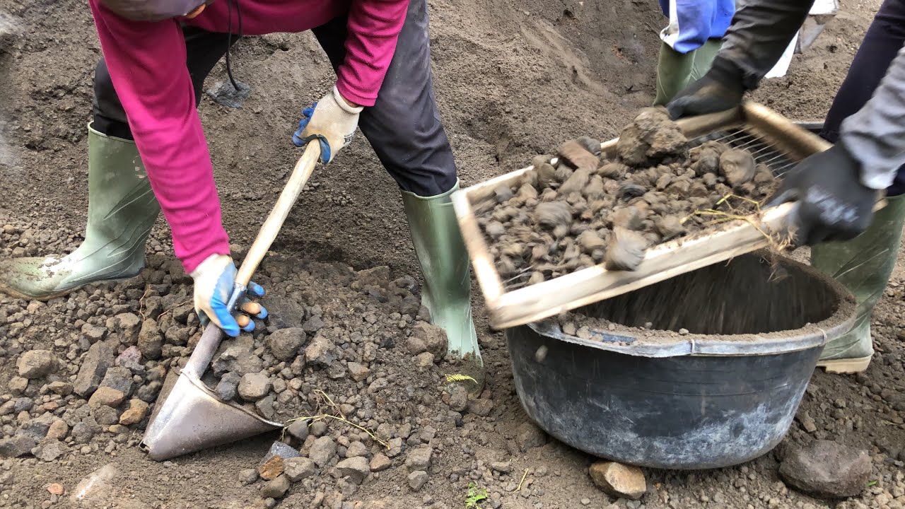 the sieving process separates sand and gravel then load it into the ...