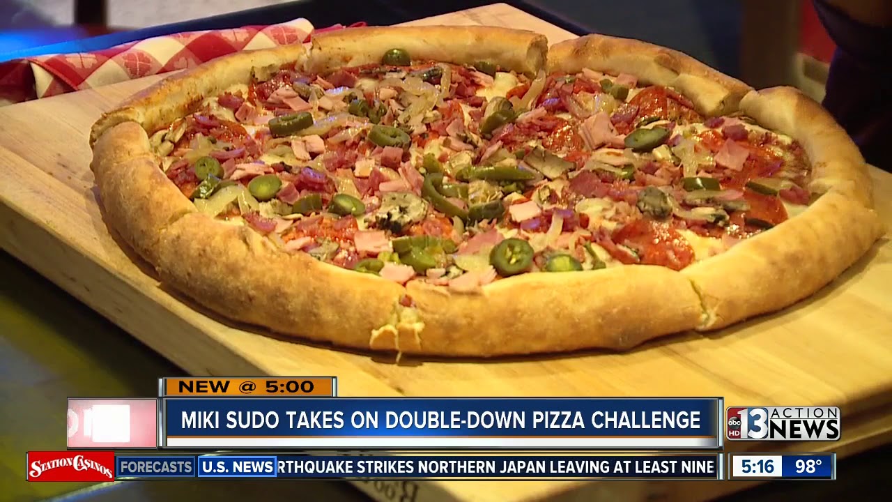 Hot dog-eating champ eats pizza in record time in Las Vegas - YouTube