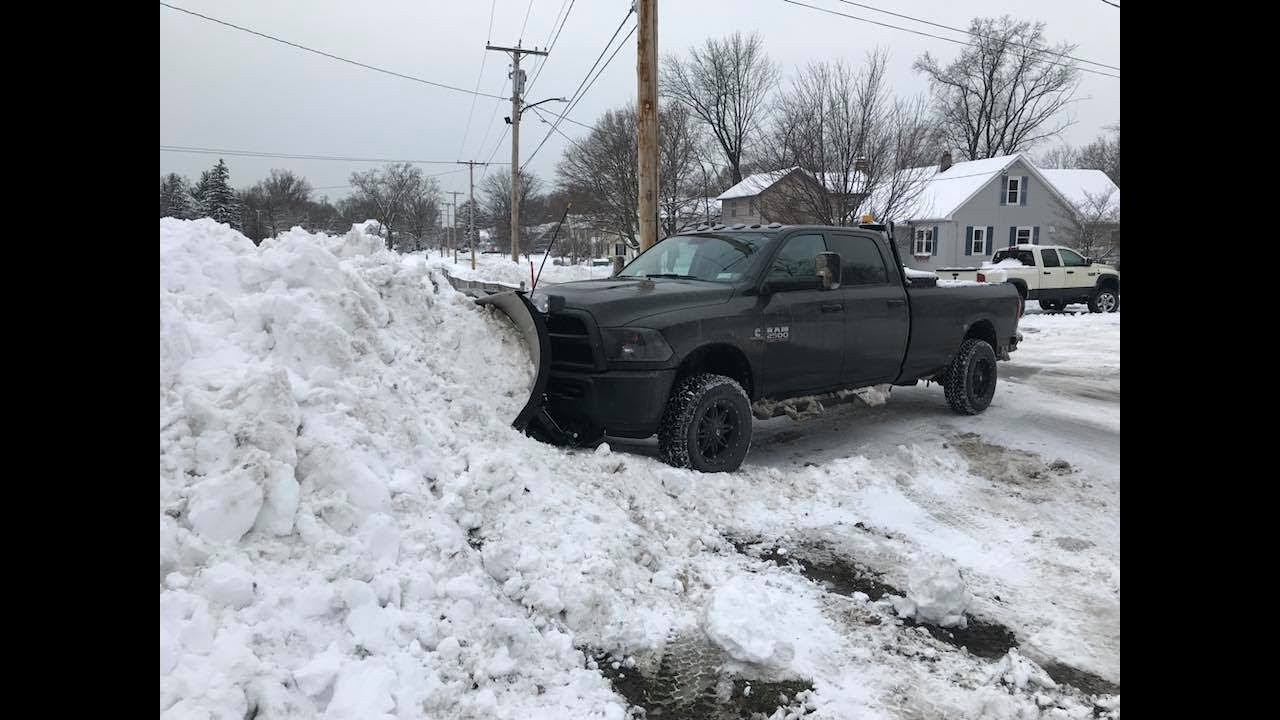 Plowing snow around obstacles - Fisher - Ram - Cummins - YouTube