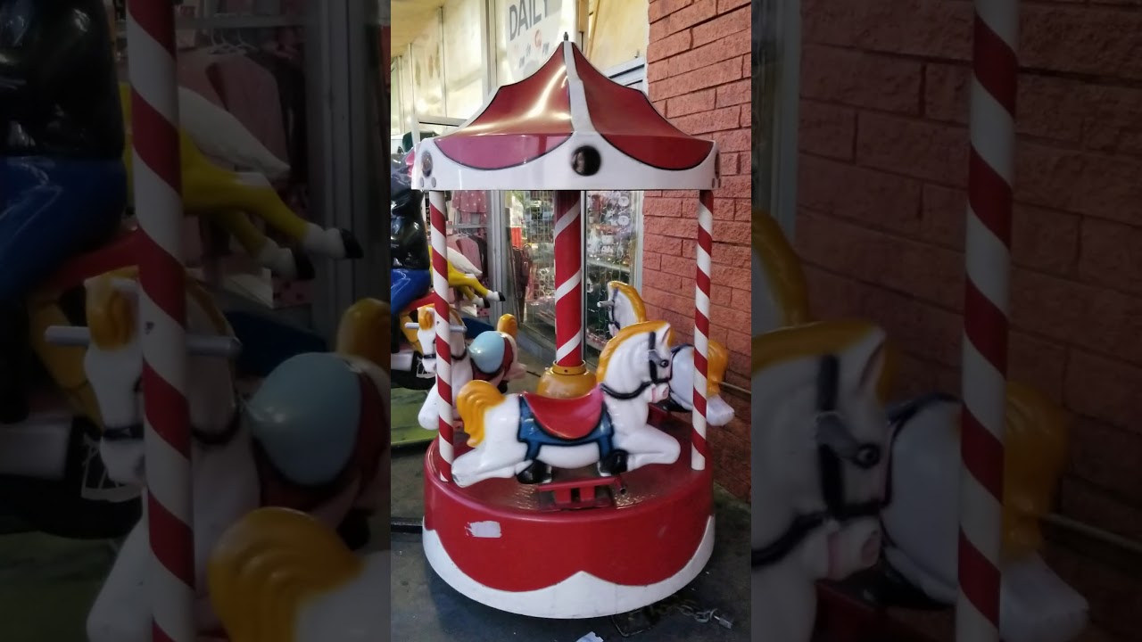 1970s Mini carousel kiddie ride (Red and white) - YouTube