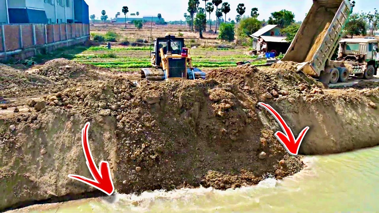 Best Road Construction Along Canal, Bulldozer Pushing Dirt Drop To ...
