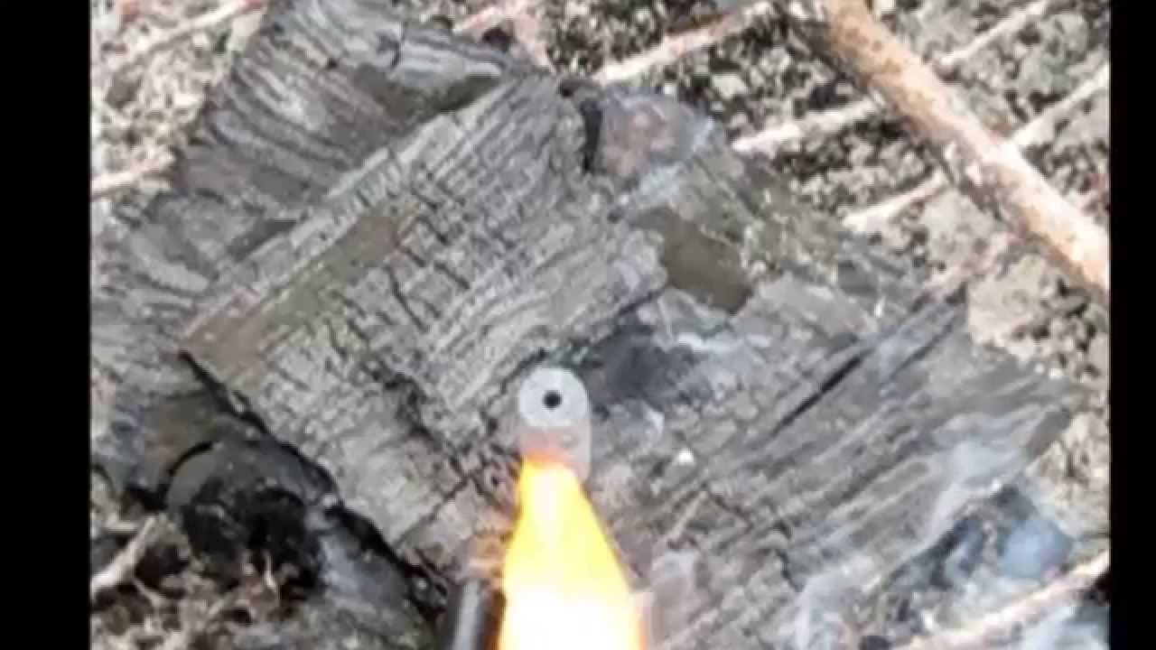 Igniting two 50/50 triple 7 black powder pellets - YouTube