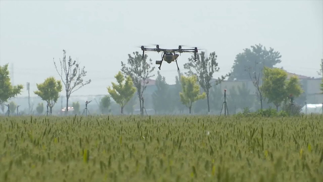 Smart technologies help with unmanned farming in China's Henan - YouTube