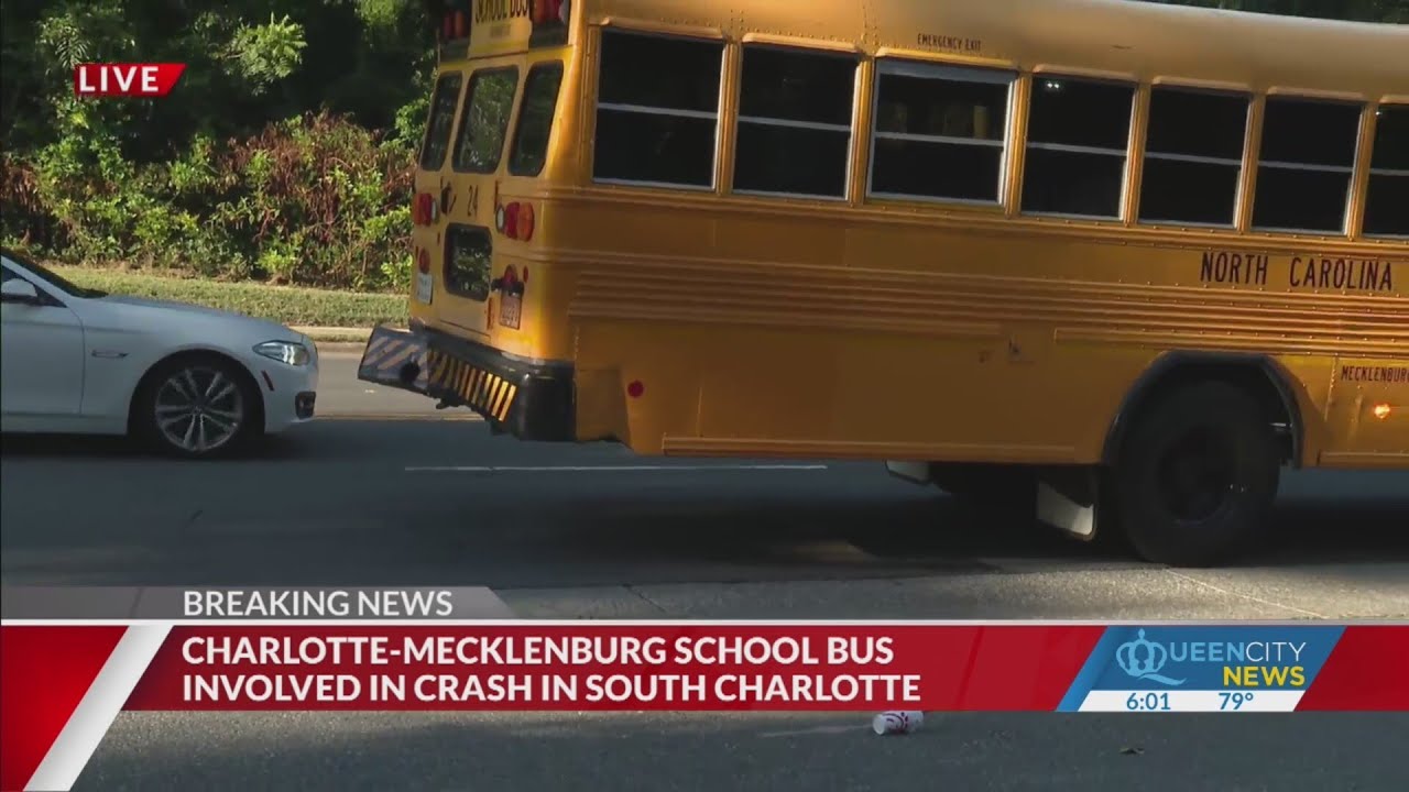 Car lodged underneath school bus in south Charlotte crash - YouTube