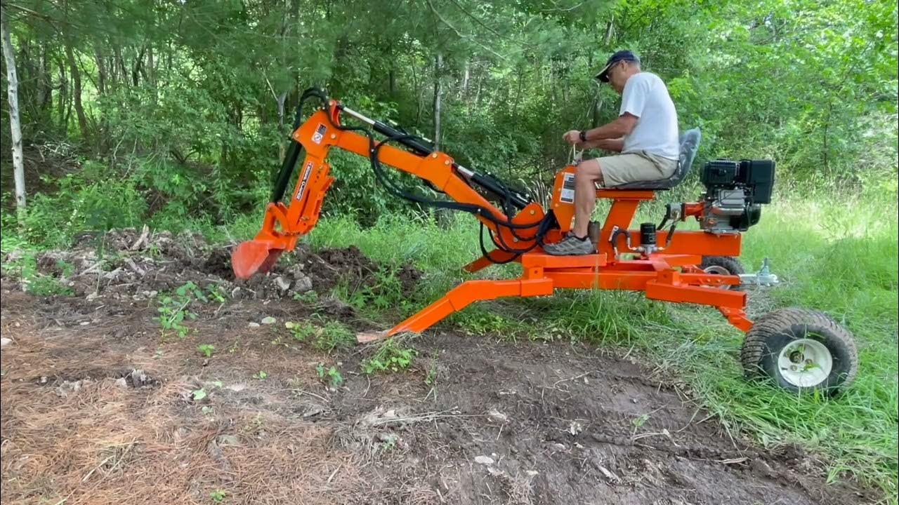 Liberty Towable 360º Backhoe/excavator digging a trench - YouTube