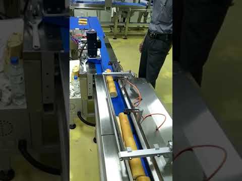 Swiss roll packaging machine， Swiss roll wrapping machine, bread ...