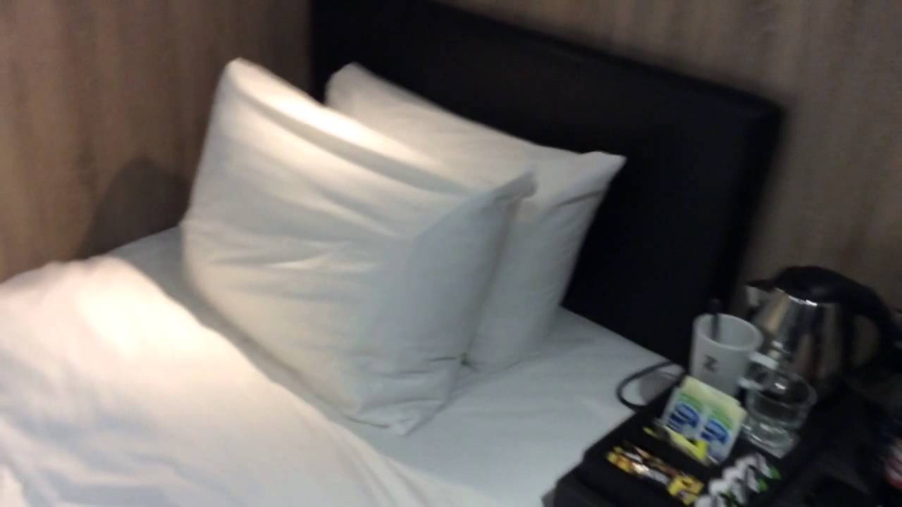 Windowless hotel room suits me fine for tonight - YouTube