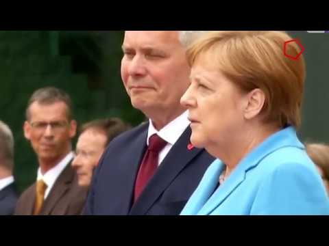 Merkel yenə titrədi