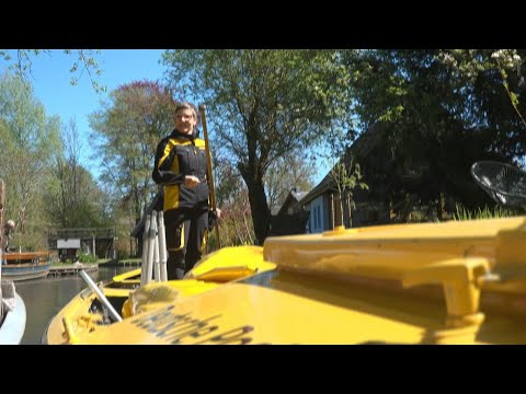 German postwoman celebrates 15 years of delivering mail by boat | AFP