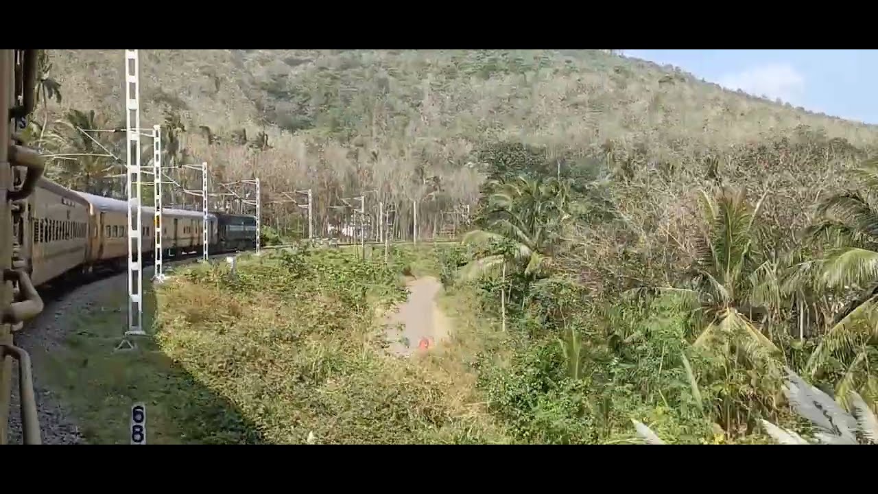 train passes through hill valleys #hills - YouTube