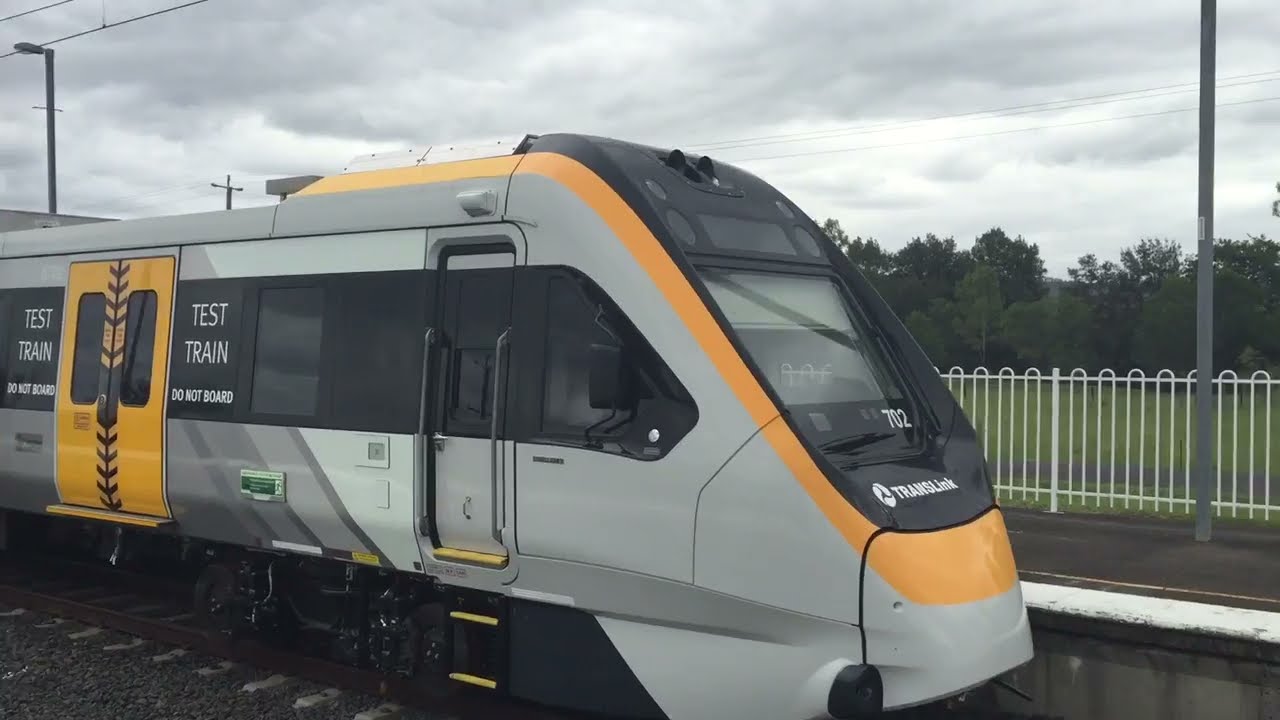 Queensland Rail NGR 702 Arriving and Departing Thagoona Station - YouTube