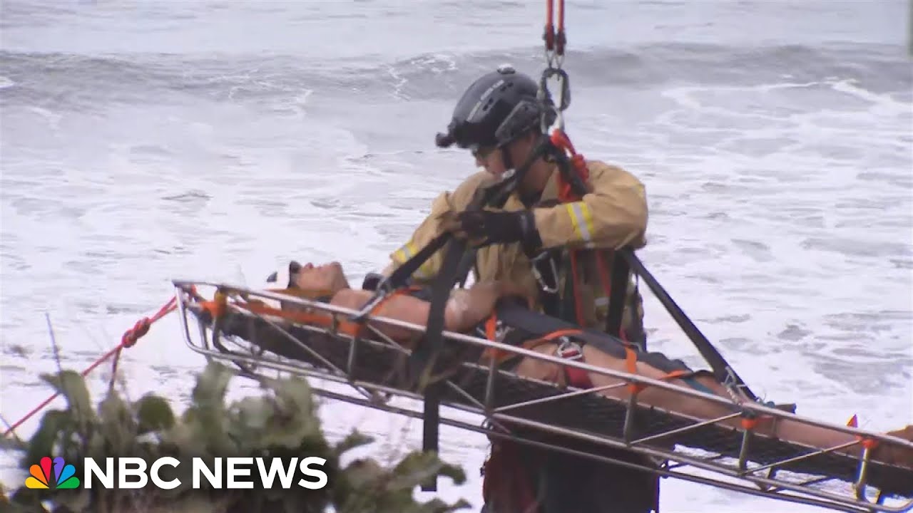 Video shows rescuers free man trapped on California cliffside - YouTube