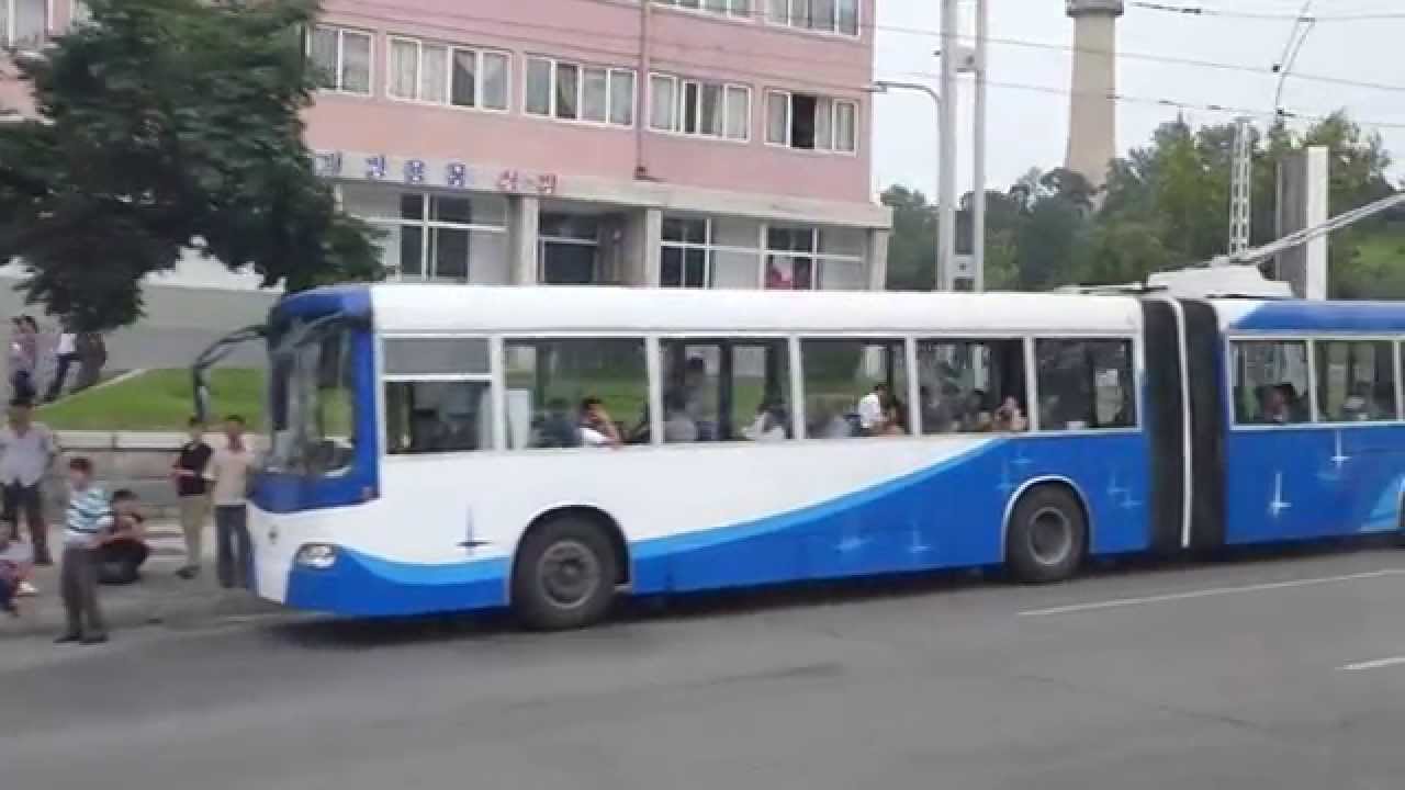 Trolley buses lined up in Pyongyang, waiting for electricity supply to ...