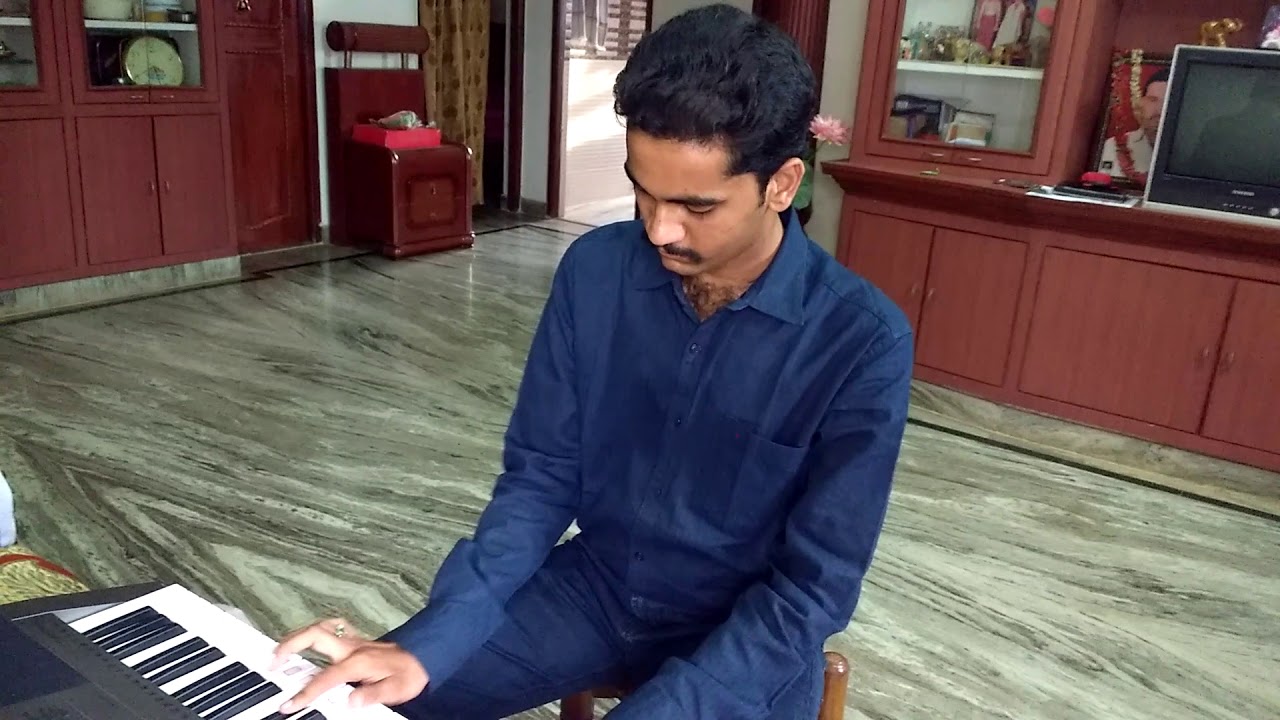 Niteesh playing keyboard at home - YouTube