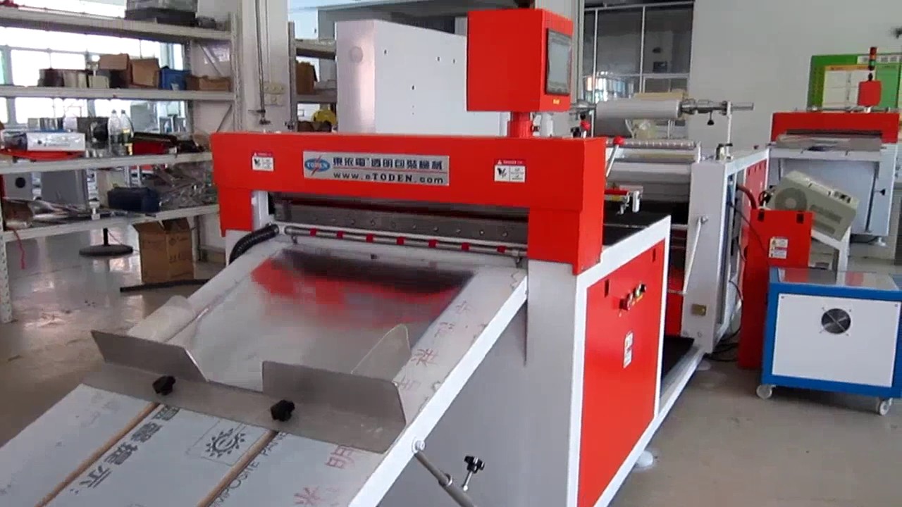 PET sheet cutting machine with corona treatment - YouTube